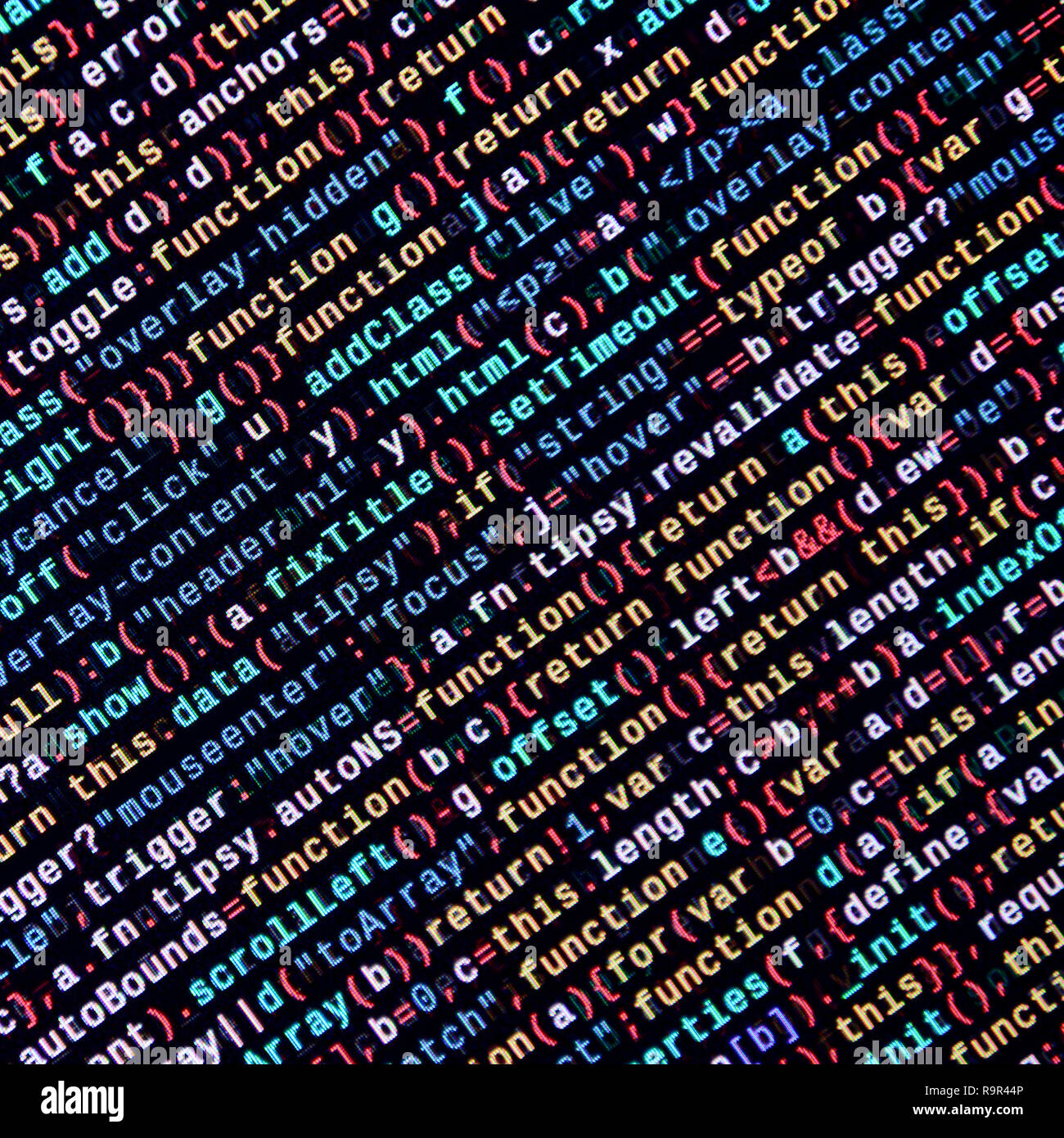 Writing programming code on laptop. Digital binary data on computer ...
