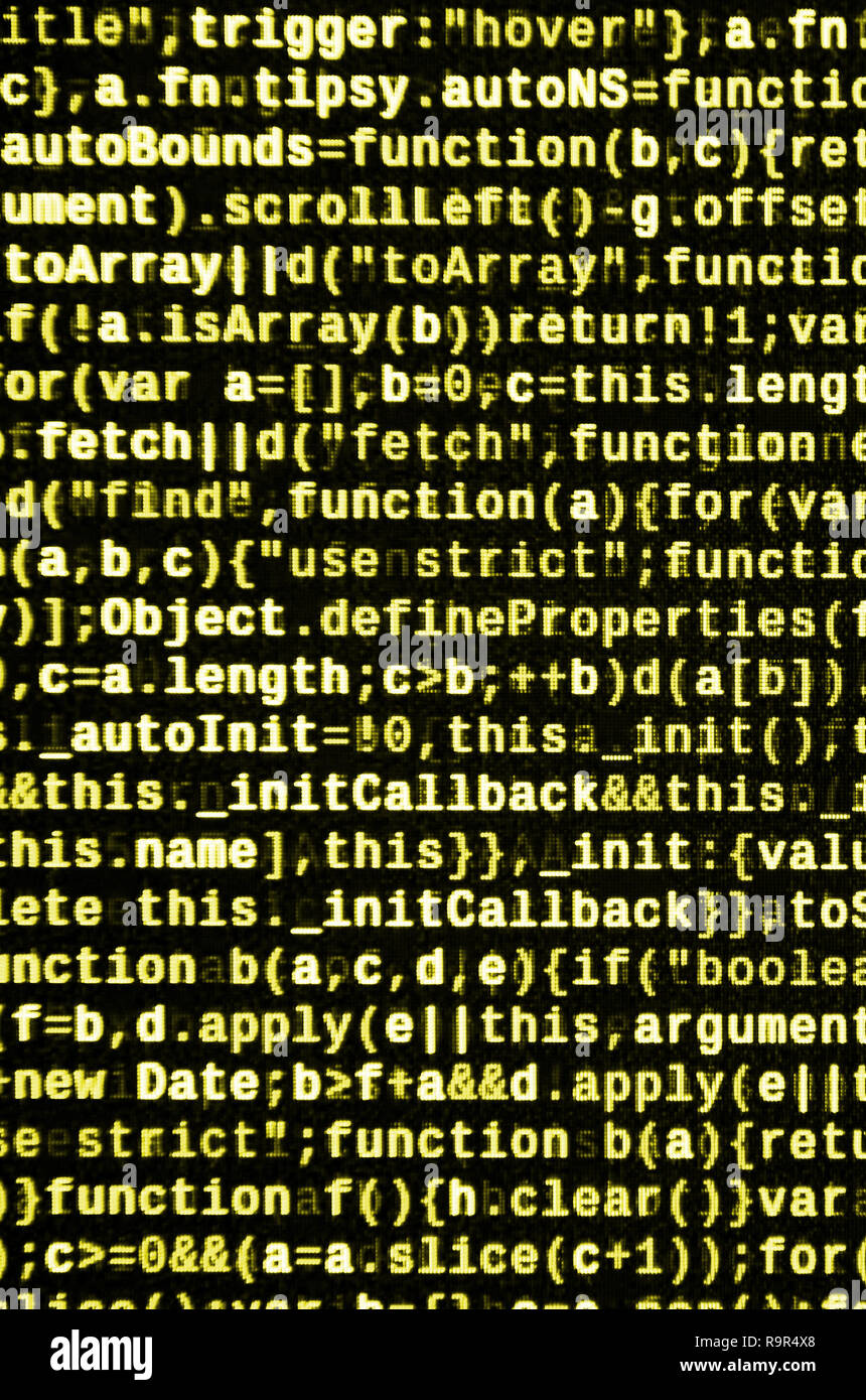 Writing programming code on laptop. Digital binary data on computer screen. Project managers ...