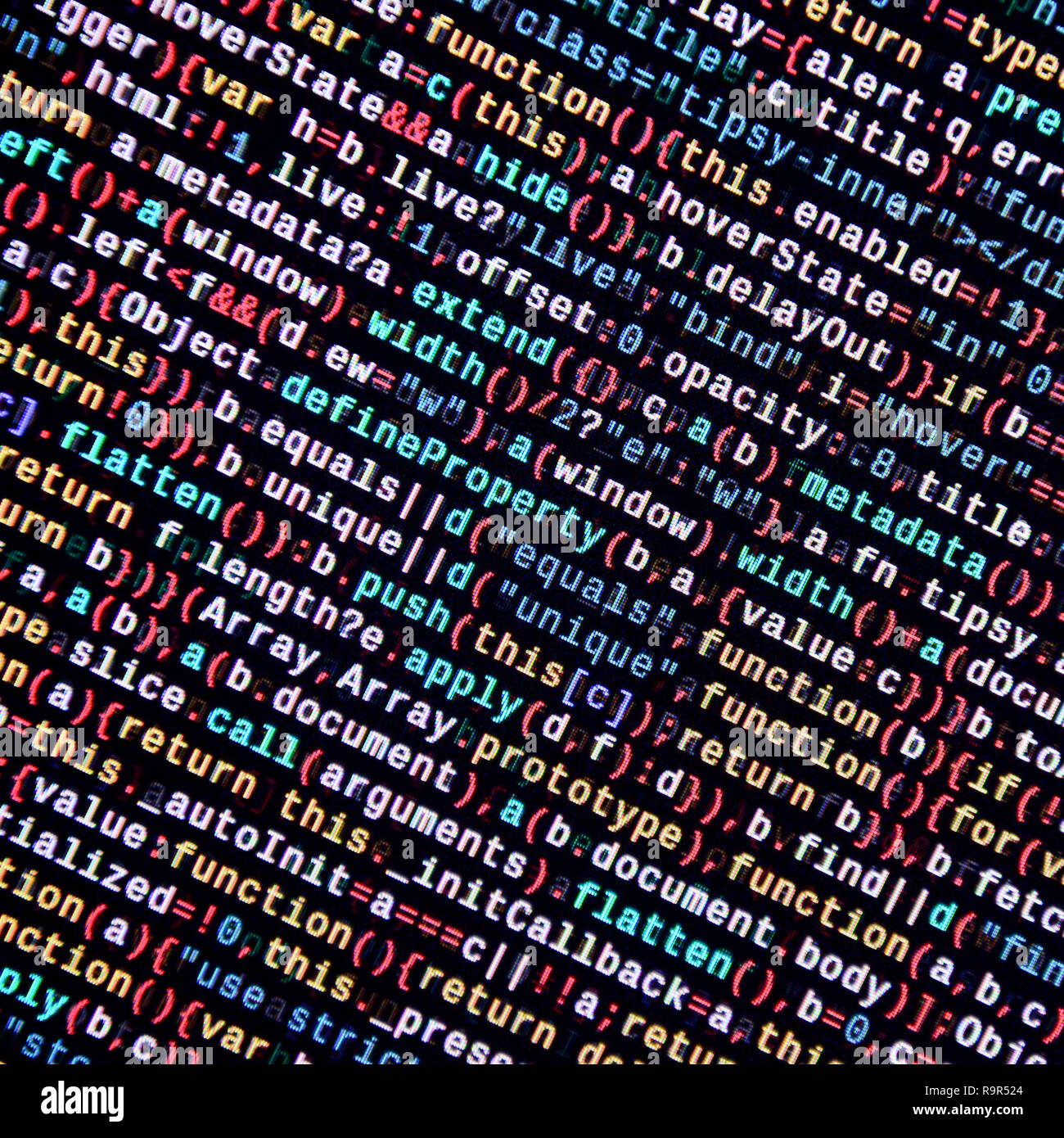 Writing programming code on laptop. Digital binary data on computer ...