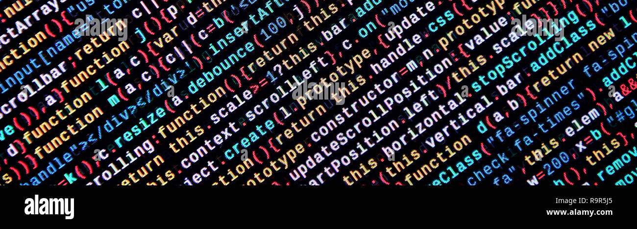 Writing programming code on laptop. Digital binary data on computer ...
