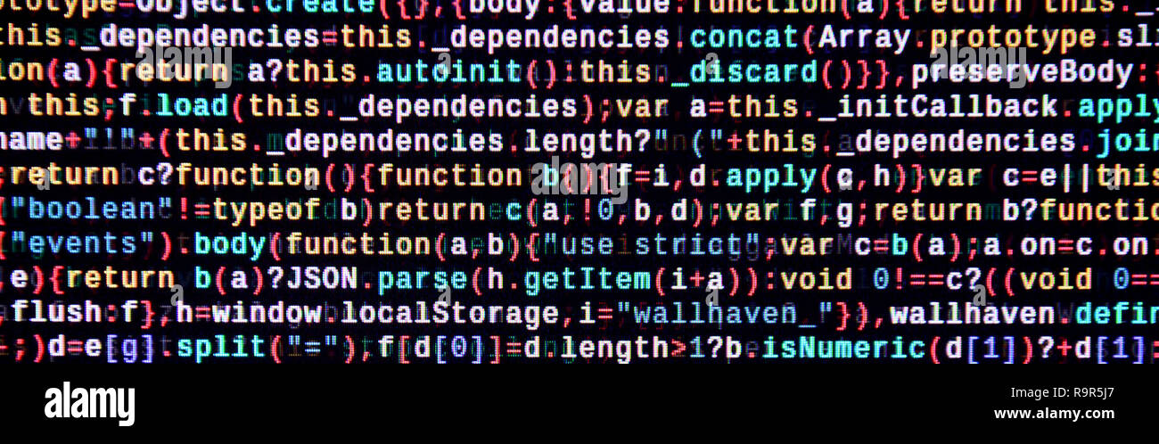 Writing programming code on laptop. Digital binary data on computer ...