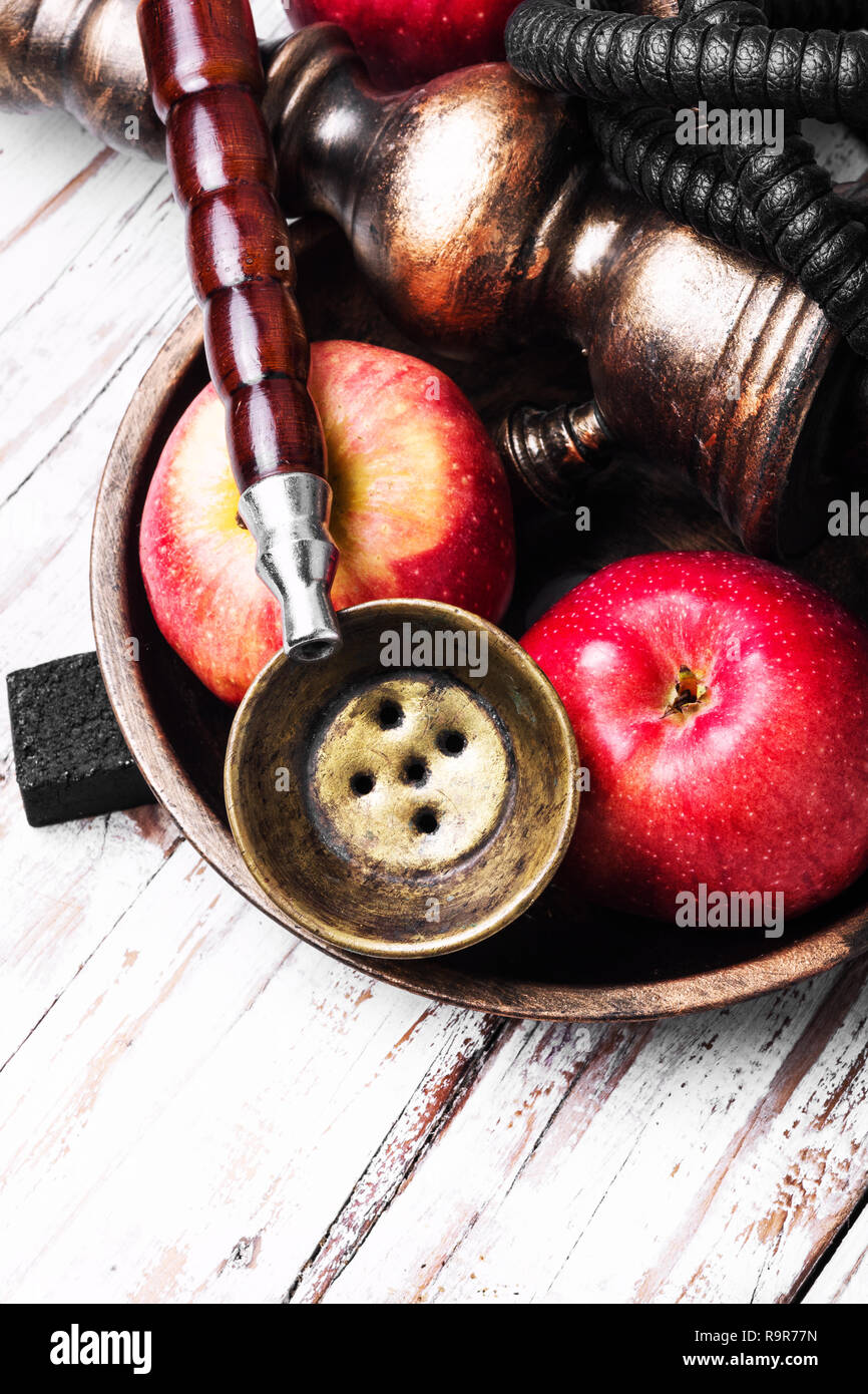 Oriental smoking hookah with mouthpieces with apple flavor.Shisha ...