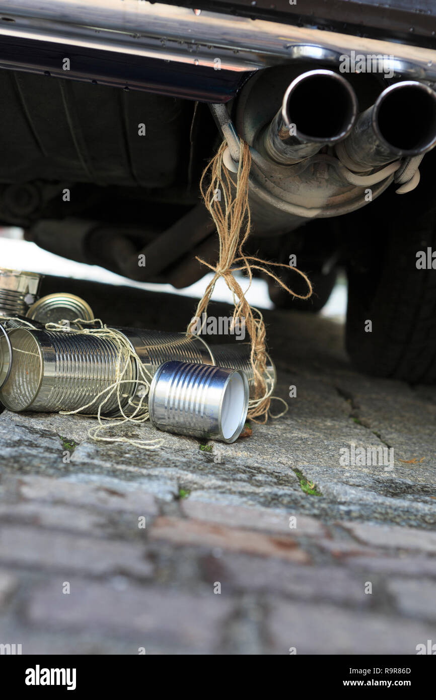 Strings attached to cans hi-res stock photography and images - Alamy