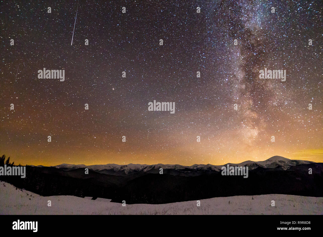 Winter mountains night landscape panorama. Milky Way bright ...