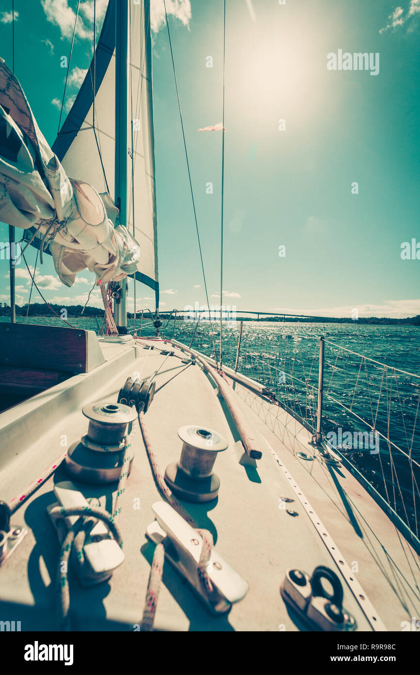 Yacht capstan with rope on sailing boat during cruise, marine objects ...