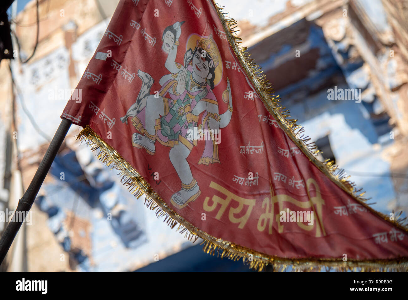 Gold fringed red flag featuring a Hindu God. Festival time in Jodhpur ...
