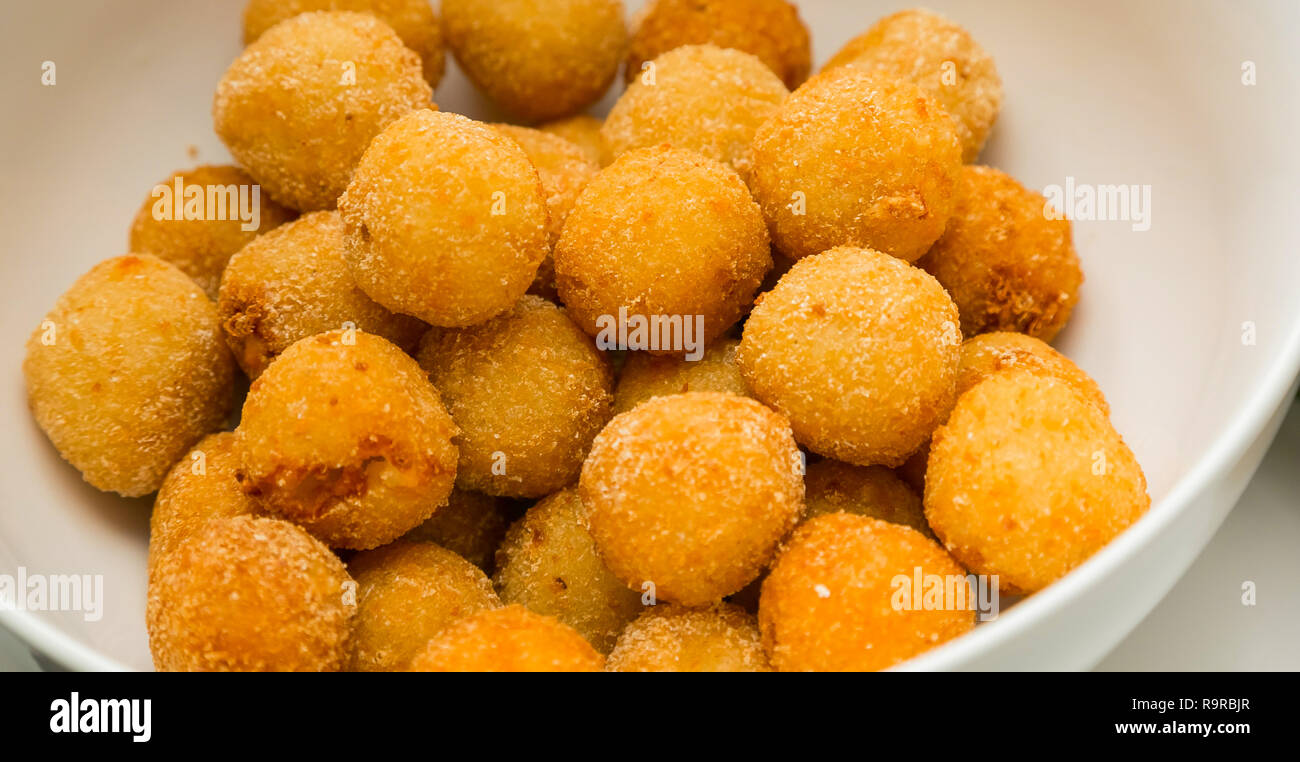 Large bowl of deep fired cheese balls for catering at a corporate event ...