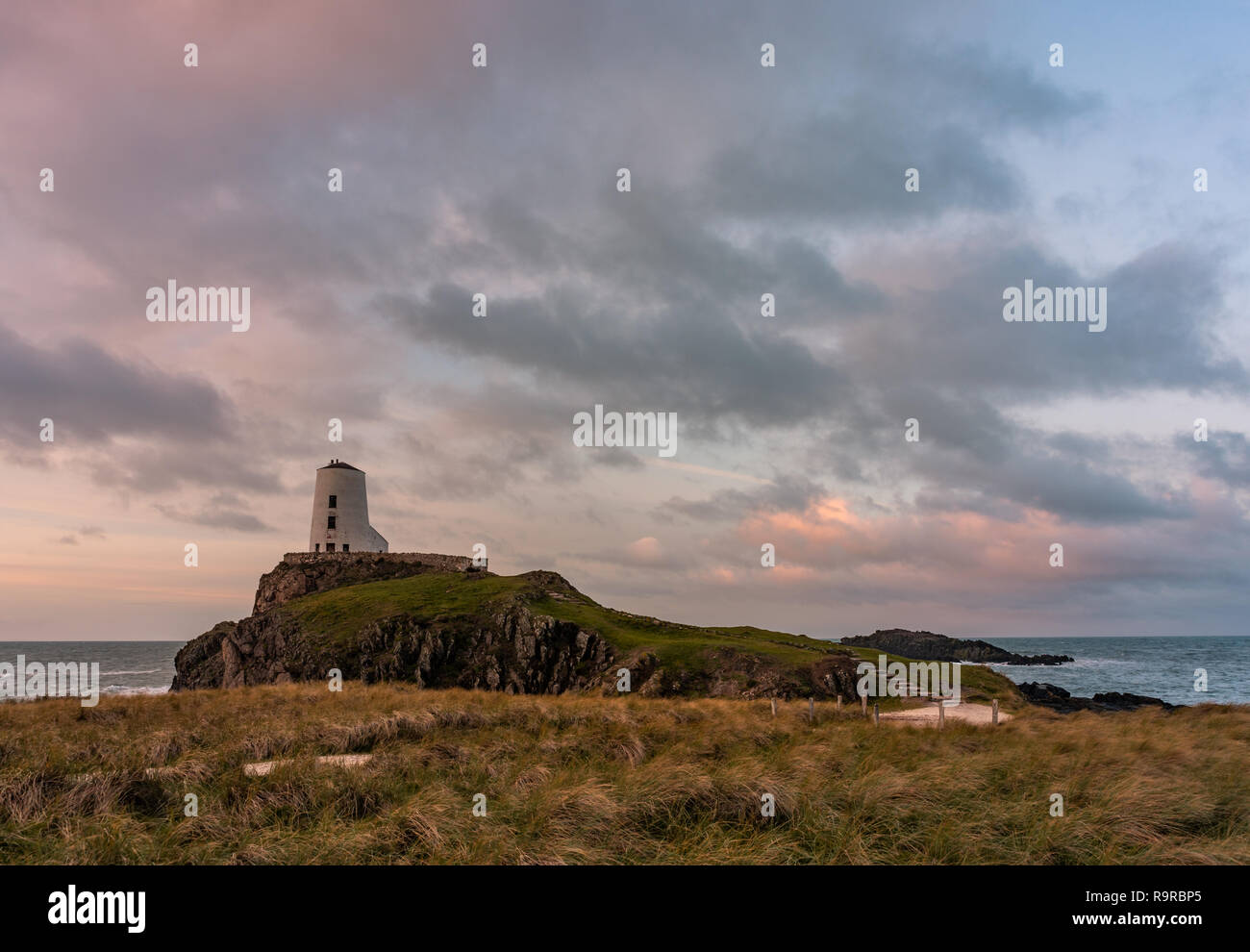 The Llanddwyn island lighthouse, Twr Mawr at Ynys Llanddwyn on Anglesey ...