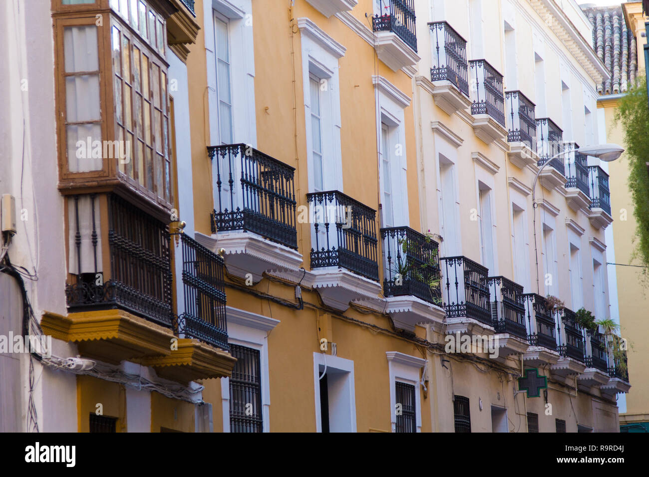 Building and street in Seville, Spain, details of old facade, wall with ...