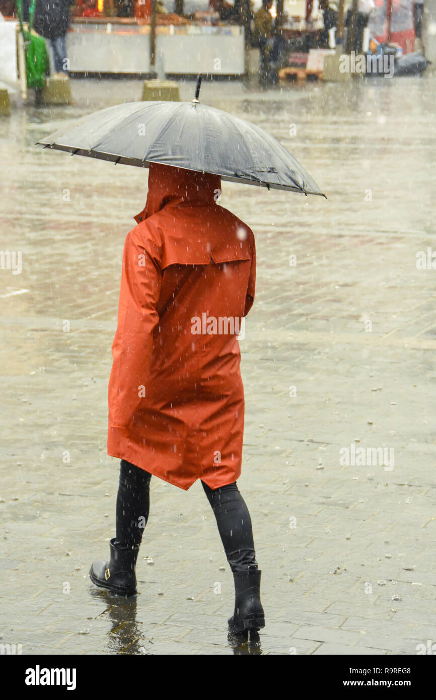 Woman umbrella rain storm hi-res stock photography and images - Alamy
