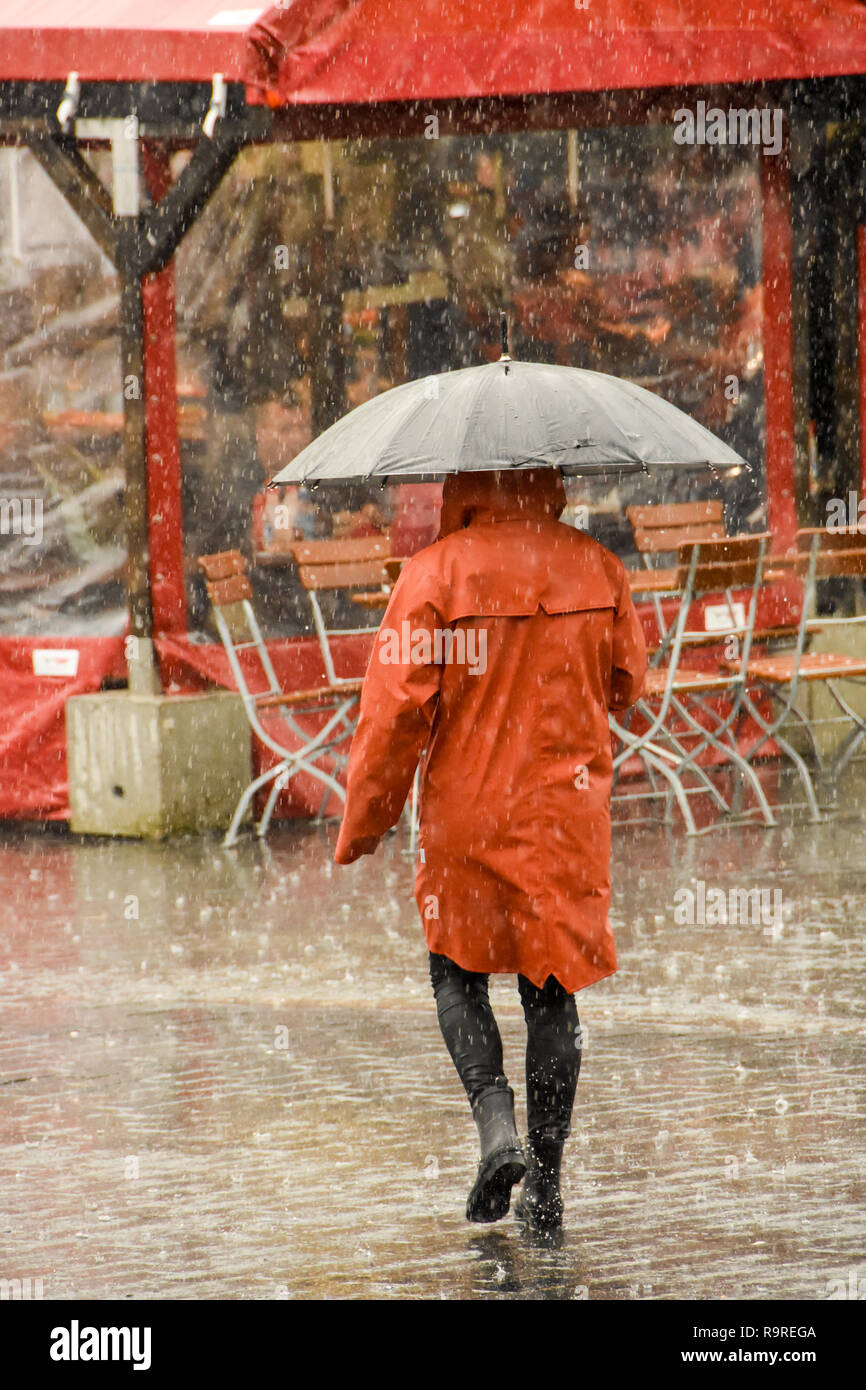 Woman umbrella rain storm hi-res stock photography and images - Alamy