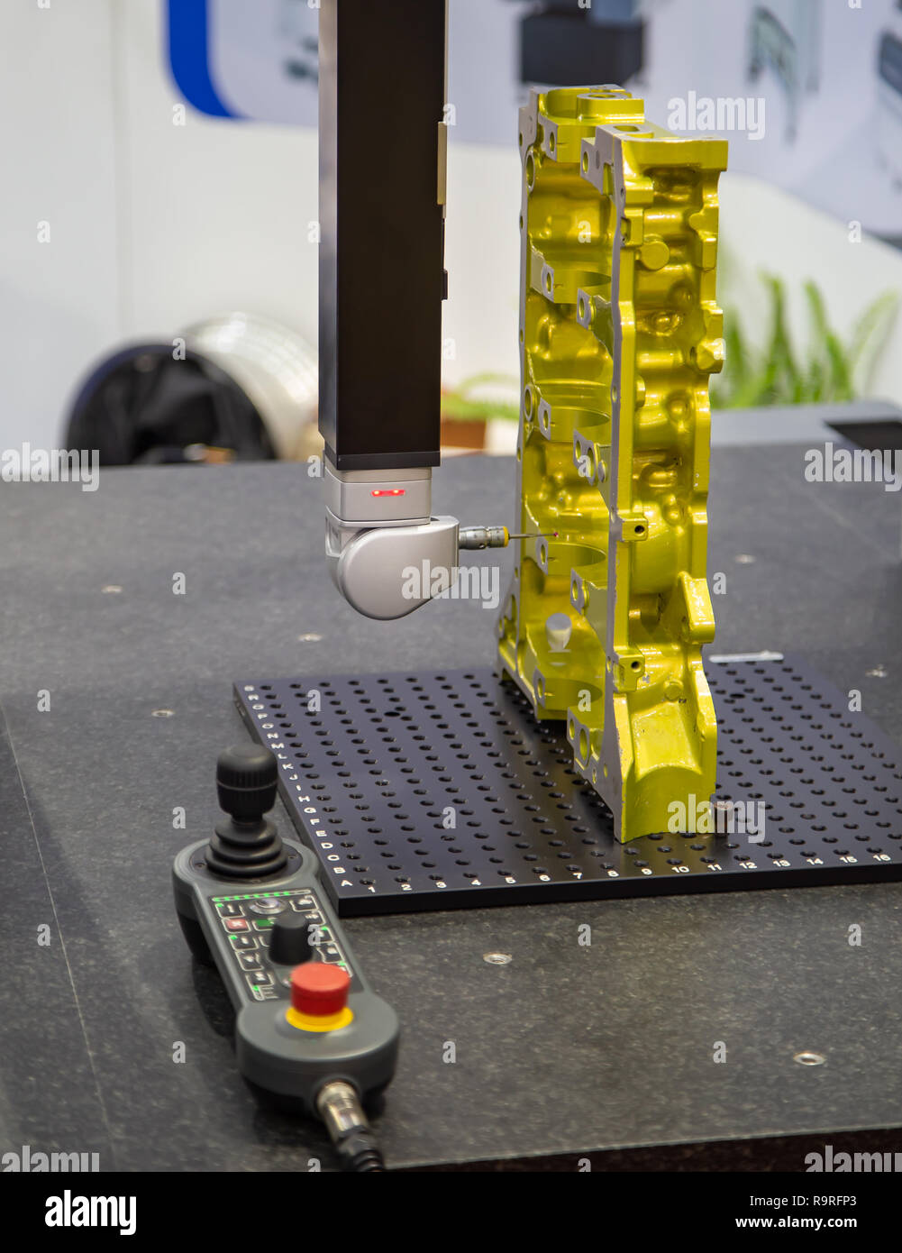 CNC Coordinate Measuring Robotic Machine measuring engine part Stock ...