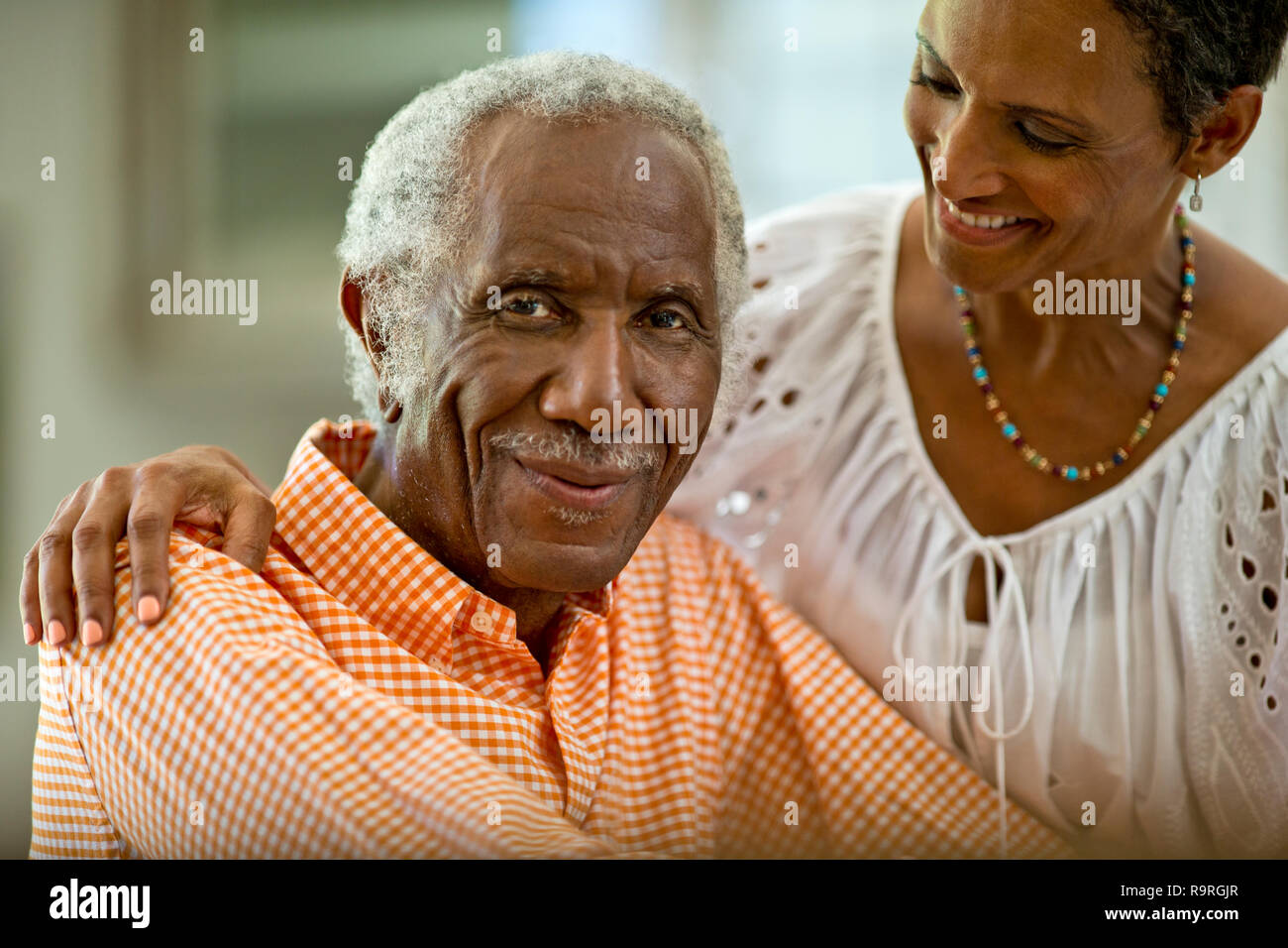Elderly father and son smile hi-res stock photography and images - Alamy