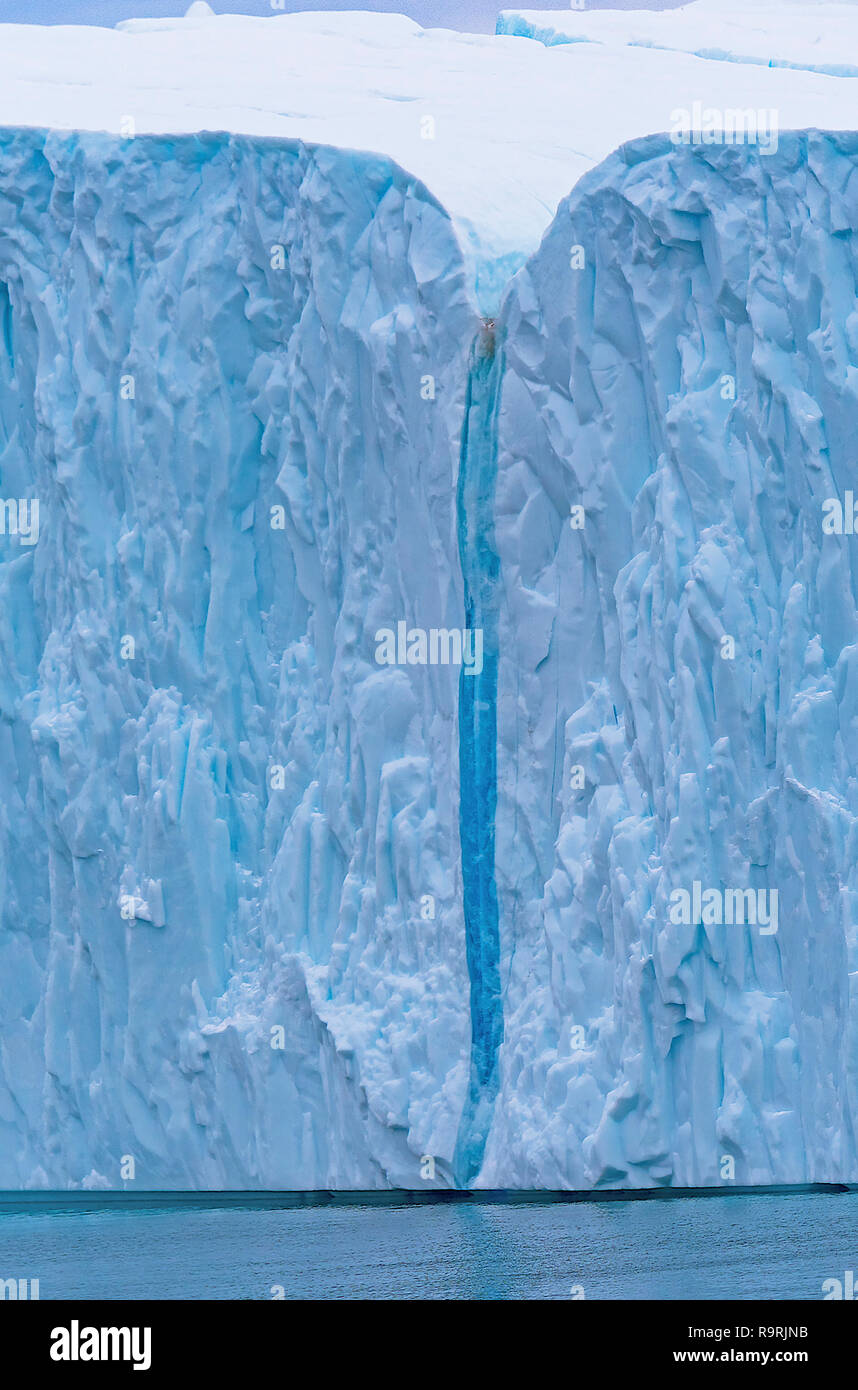 Colorful Waterfall on an Iceberg near Ilulissat, Greenland Stock Photo ...