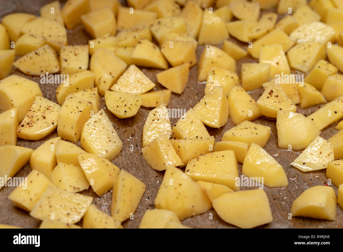 Kitchen cut potatoes cubes potatoes hi-res stock photography and images ...
