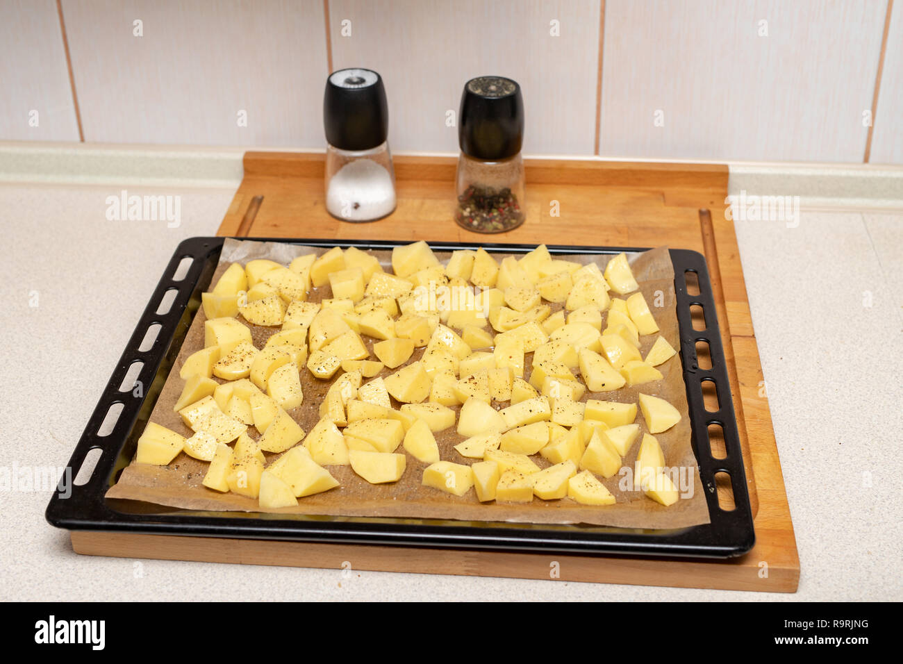 Kitchen cut potatoes cubes potatoes hi-res stock photography and images ...