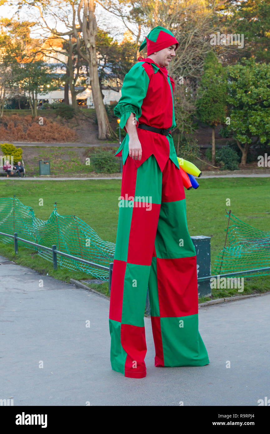 Man on stilts dressed tree hi-res stock photography and images - Alamy