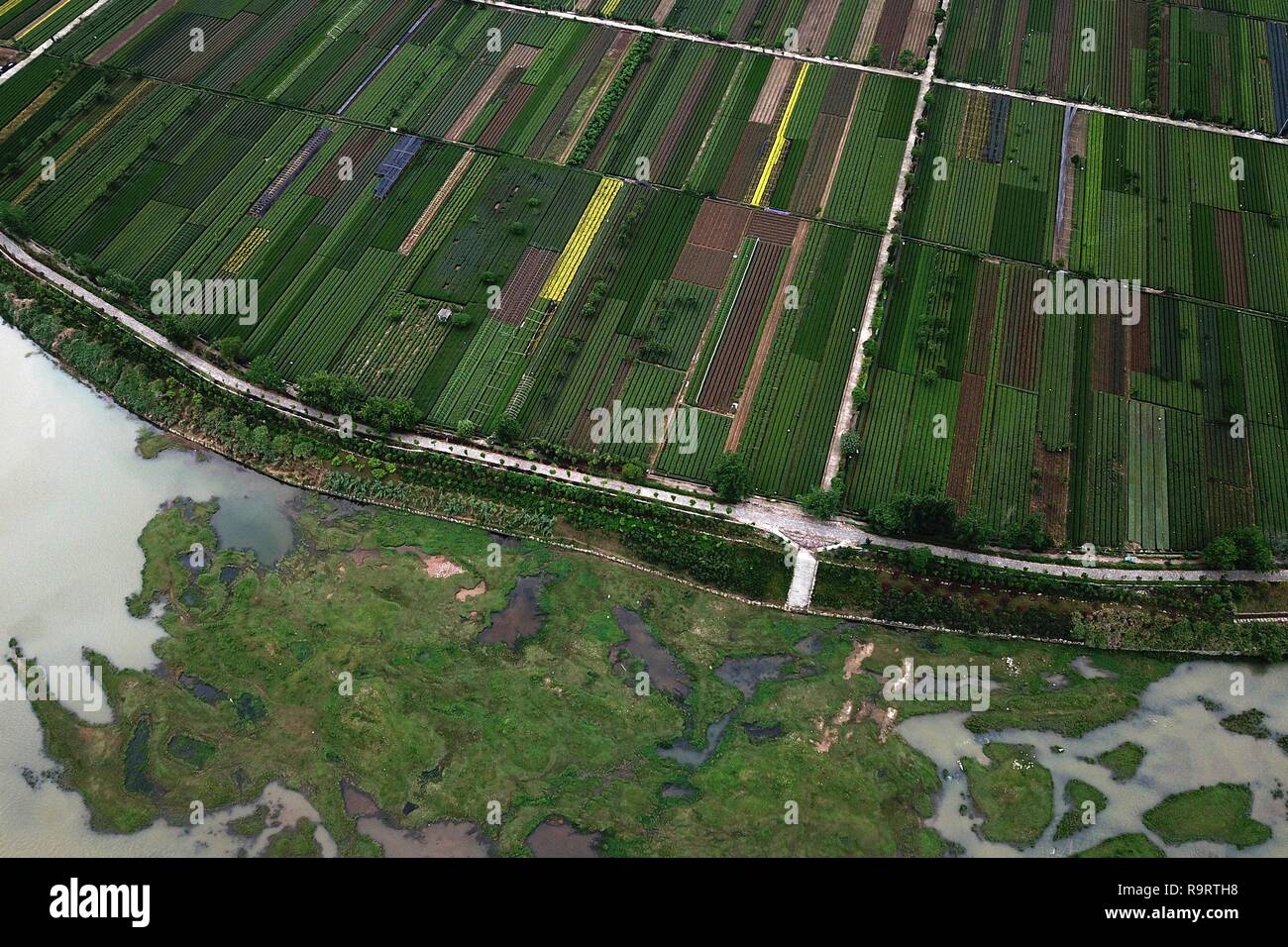 Beijing, China. 24th Apr, 2018. Aerial photo taken on April 24, 2018 ...