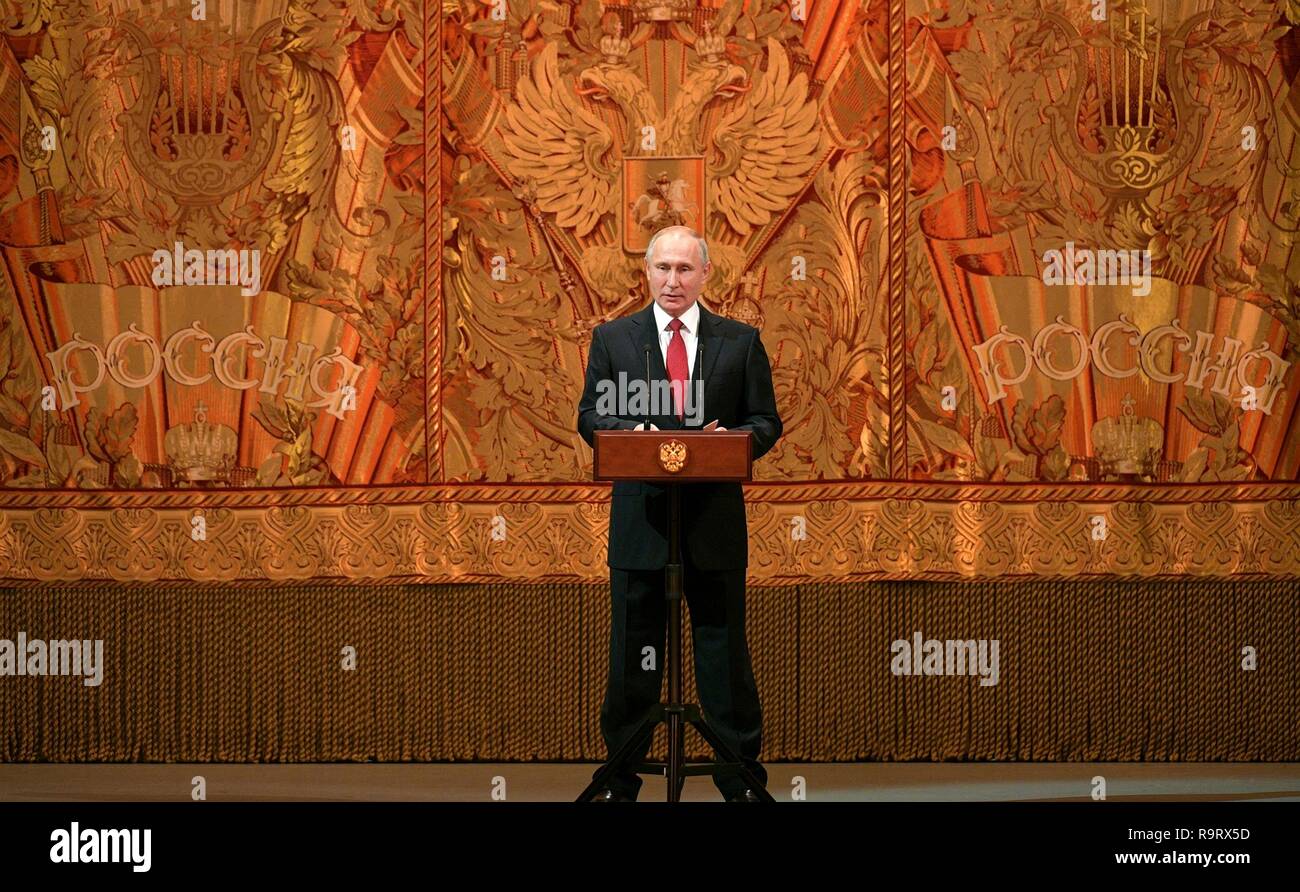 Russian President Vladimir Putin addresses the audience gathered for a ...
