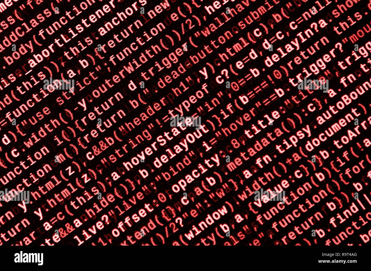 Writing programming code on laptop. Digital binary data on computer screen. Project managers ...