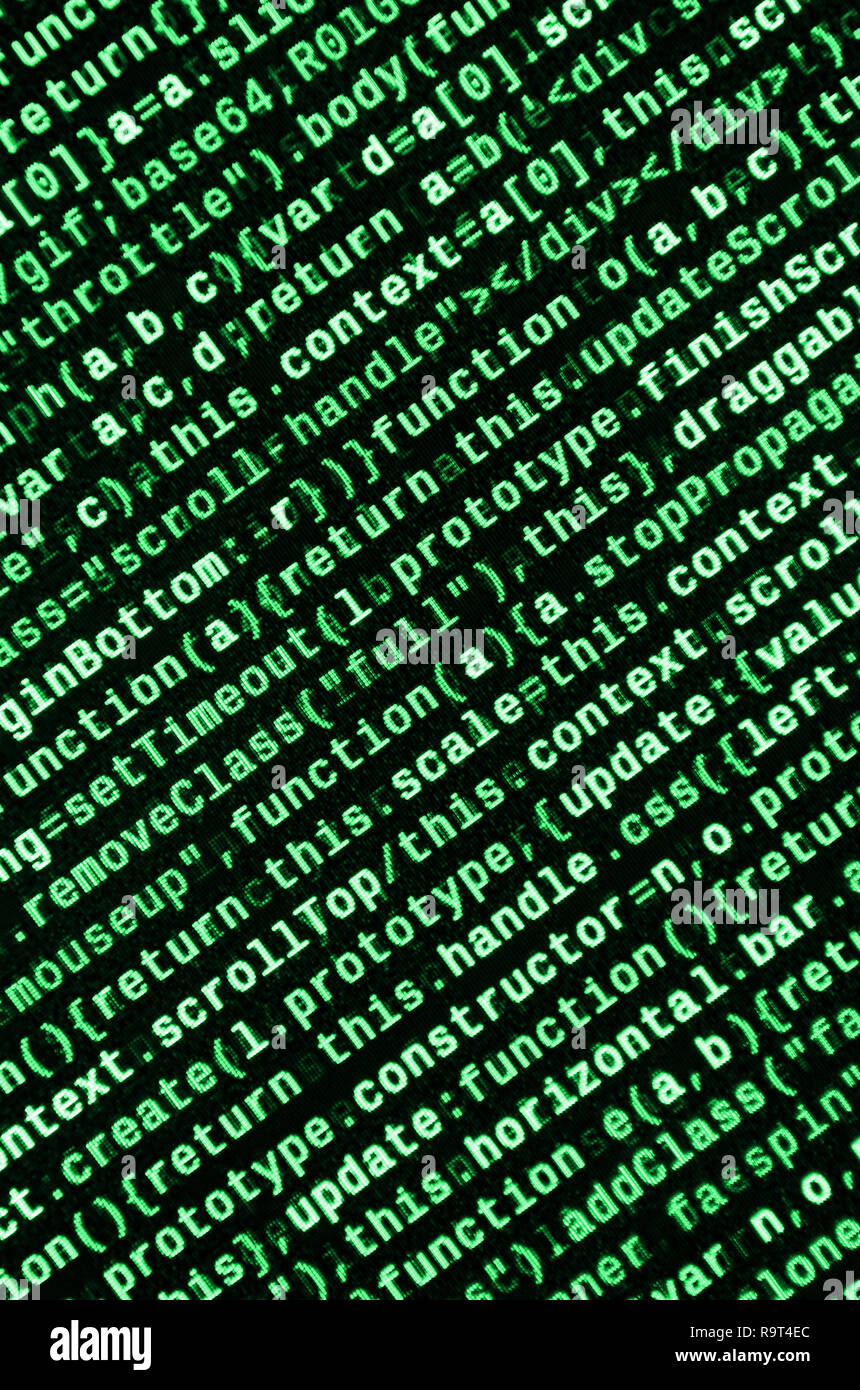 Writing programming code on laptop. Digital binary data on computer ...