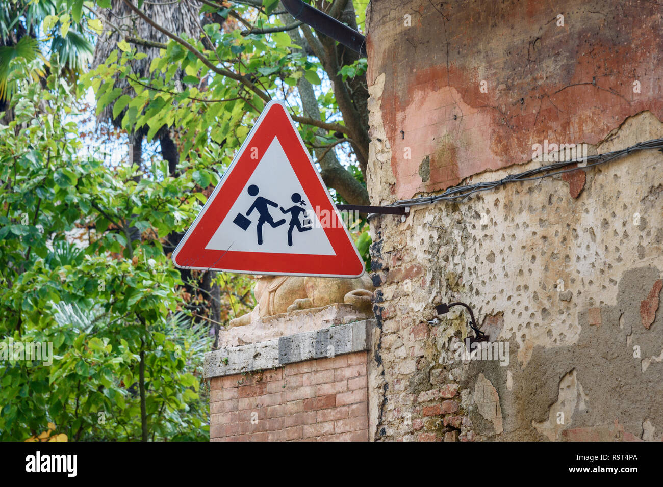 Warning road sign of Children on the medieval street in Siena. Italy ...
