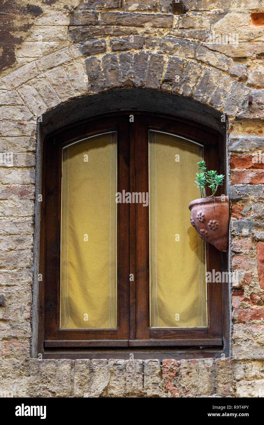 Traditional window of old house in Siena. Italy Stock Photo - Alamy