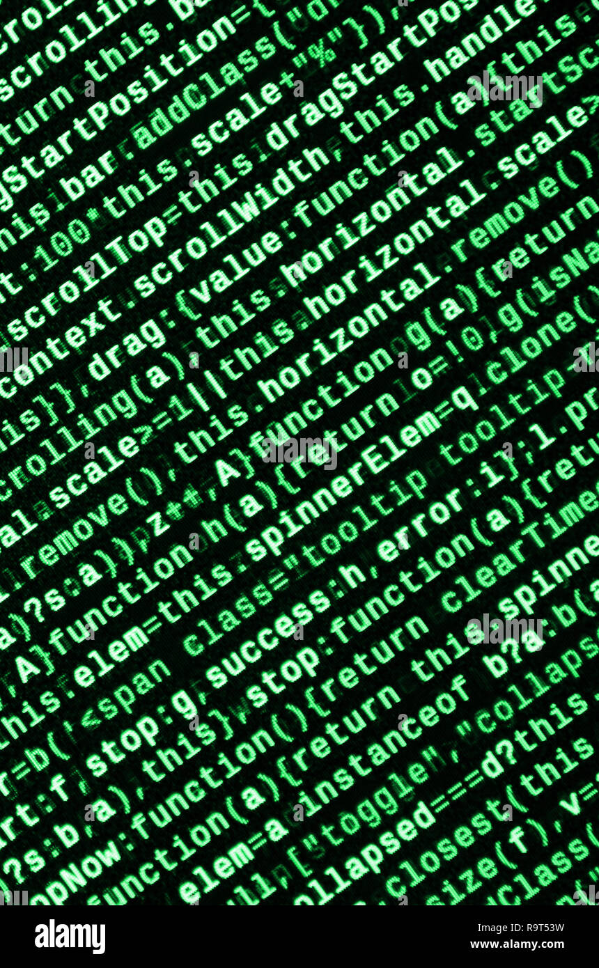 Writing programming code on laptop. Digital binary data on computer ...