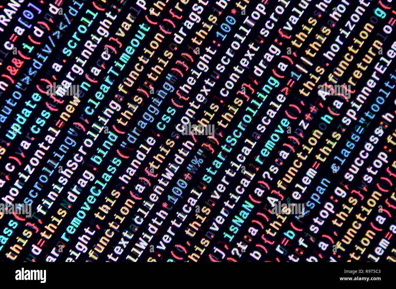 Writing programming code on laptop. Digital binary data on computer ...