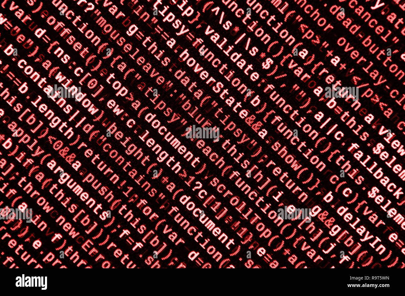 Writing programming code on laptop. Digital binary data on computer ...