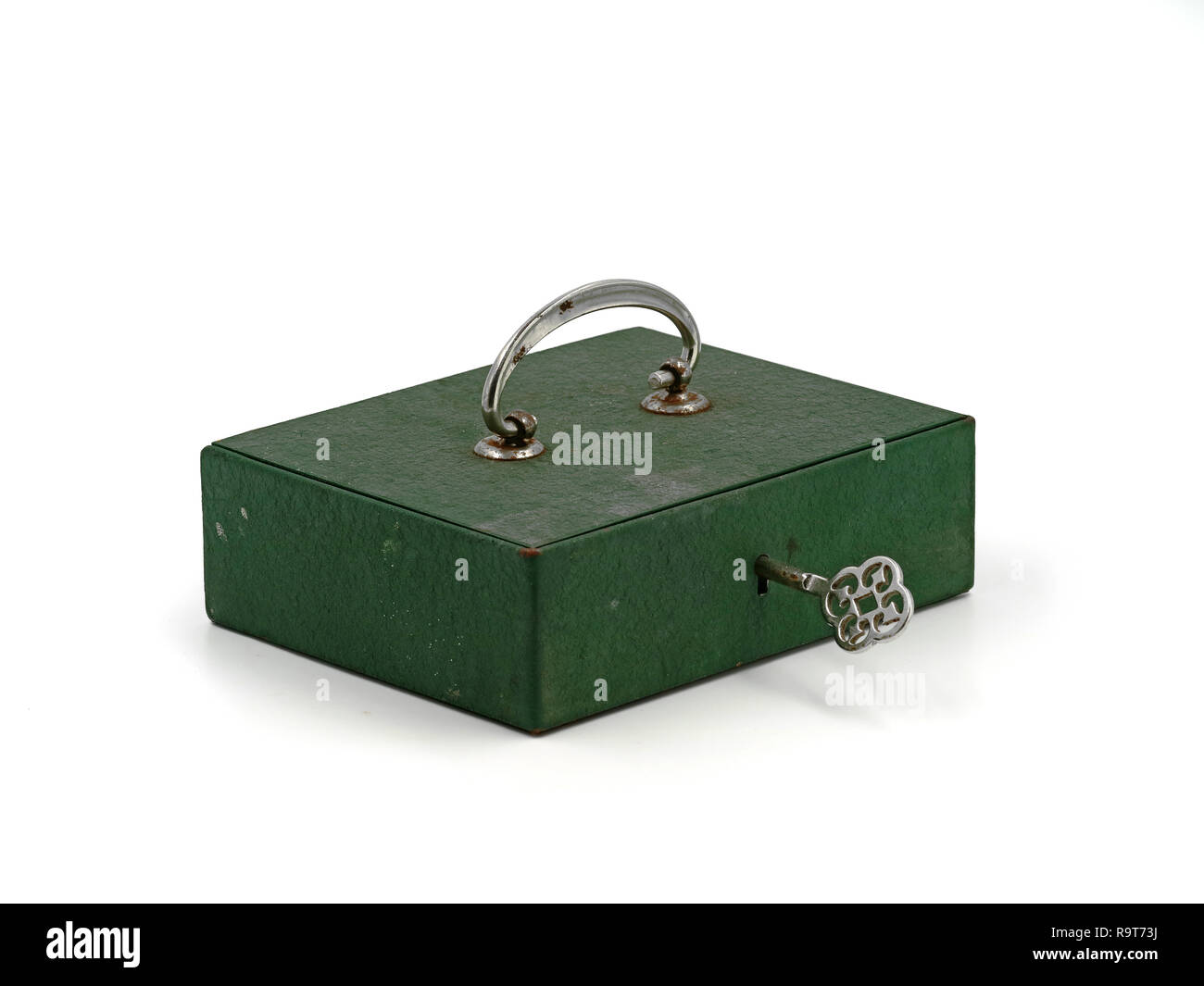 Green vintage old iron mini lock box, cash box with key isolated on ...