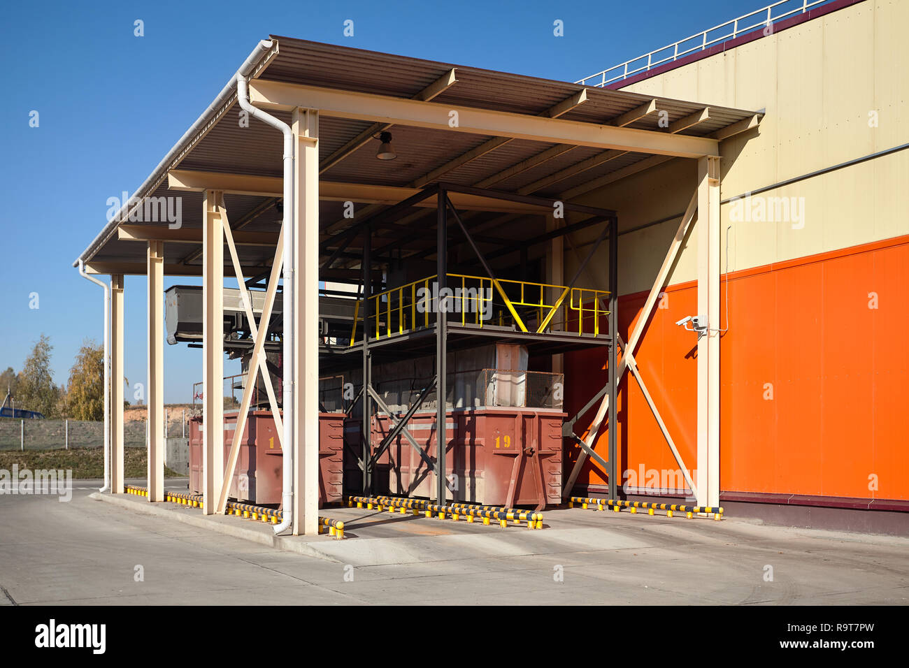 Modern waste sorting and recycling plant. Place of garbage containers ...