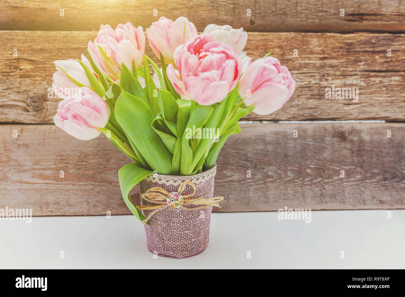 Spring greeting card. Bouquet of fresh light pastel pink tulips flowers ...