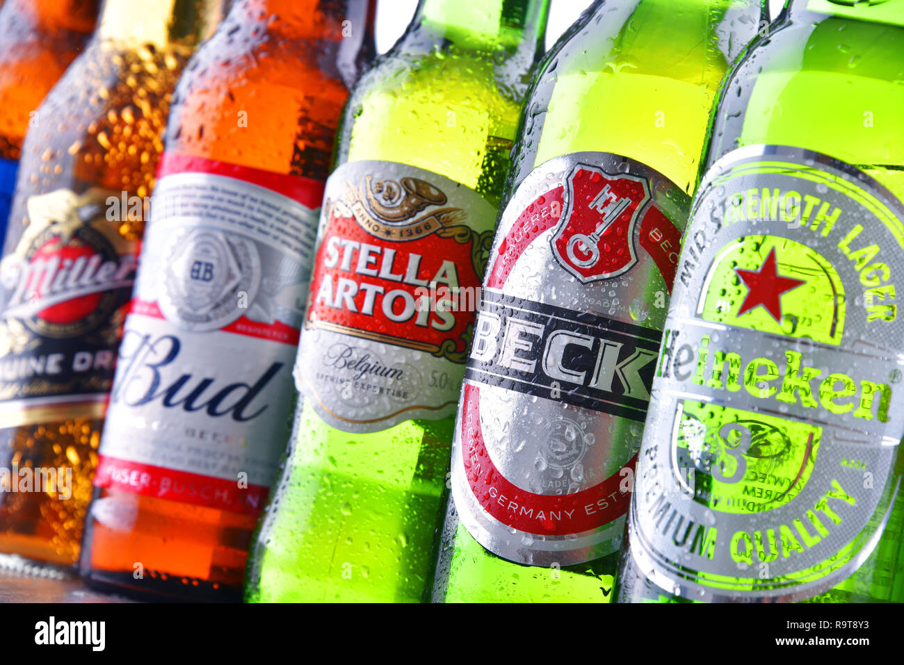 POZNAN, POL - JULY 19, 2018: Bottles of famous global beer brands ...