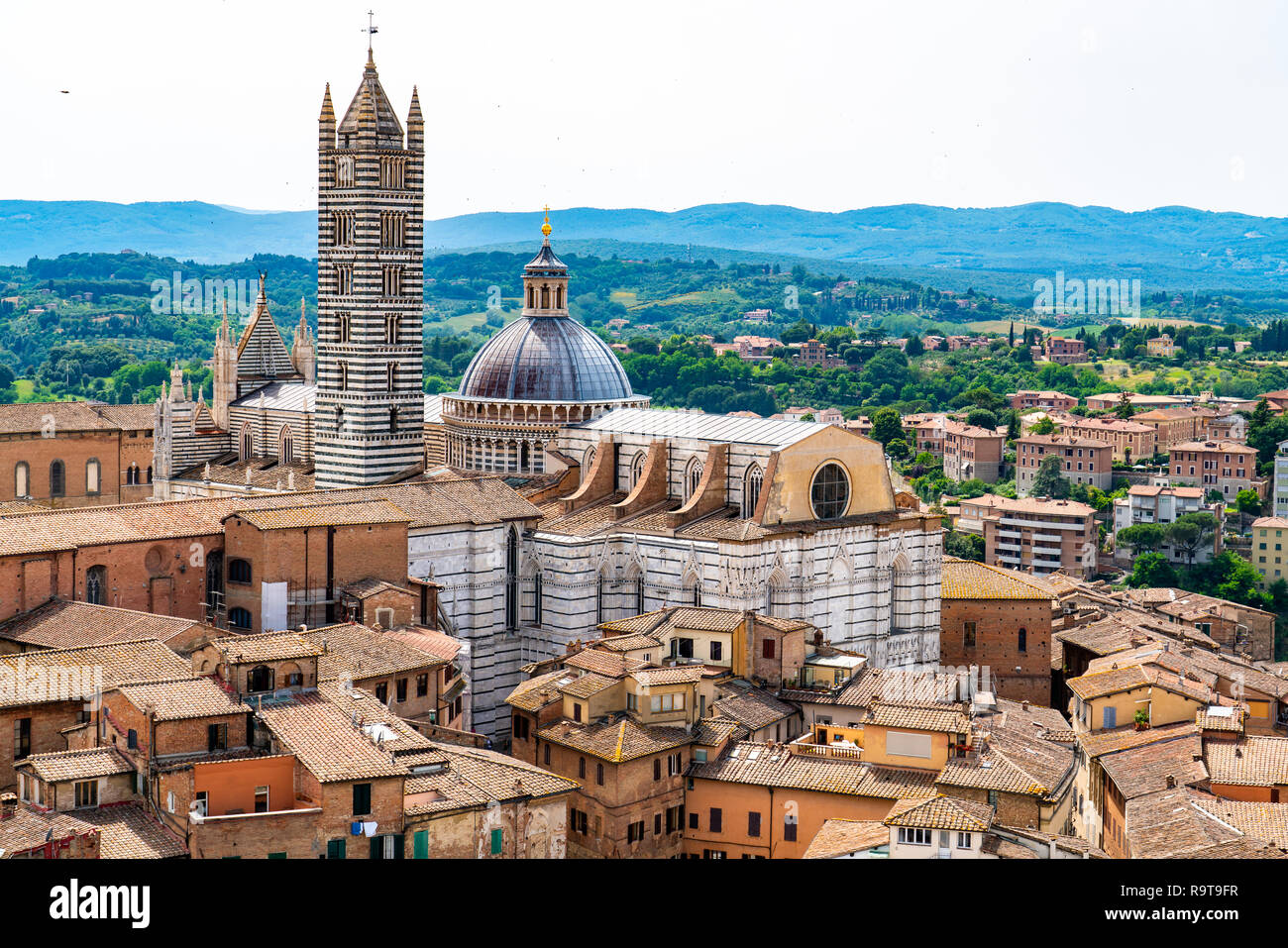 Aerial view of Siena Cathedral and the cityscape of Siena in Tuscany ...