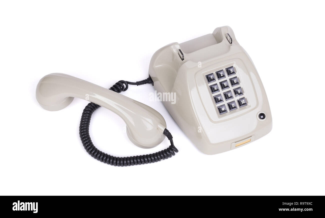 Vintage grey telephone with a white background Stock Photo - Alamy