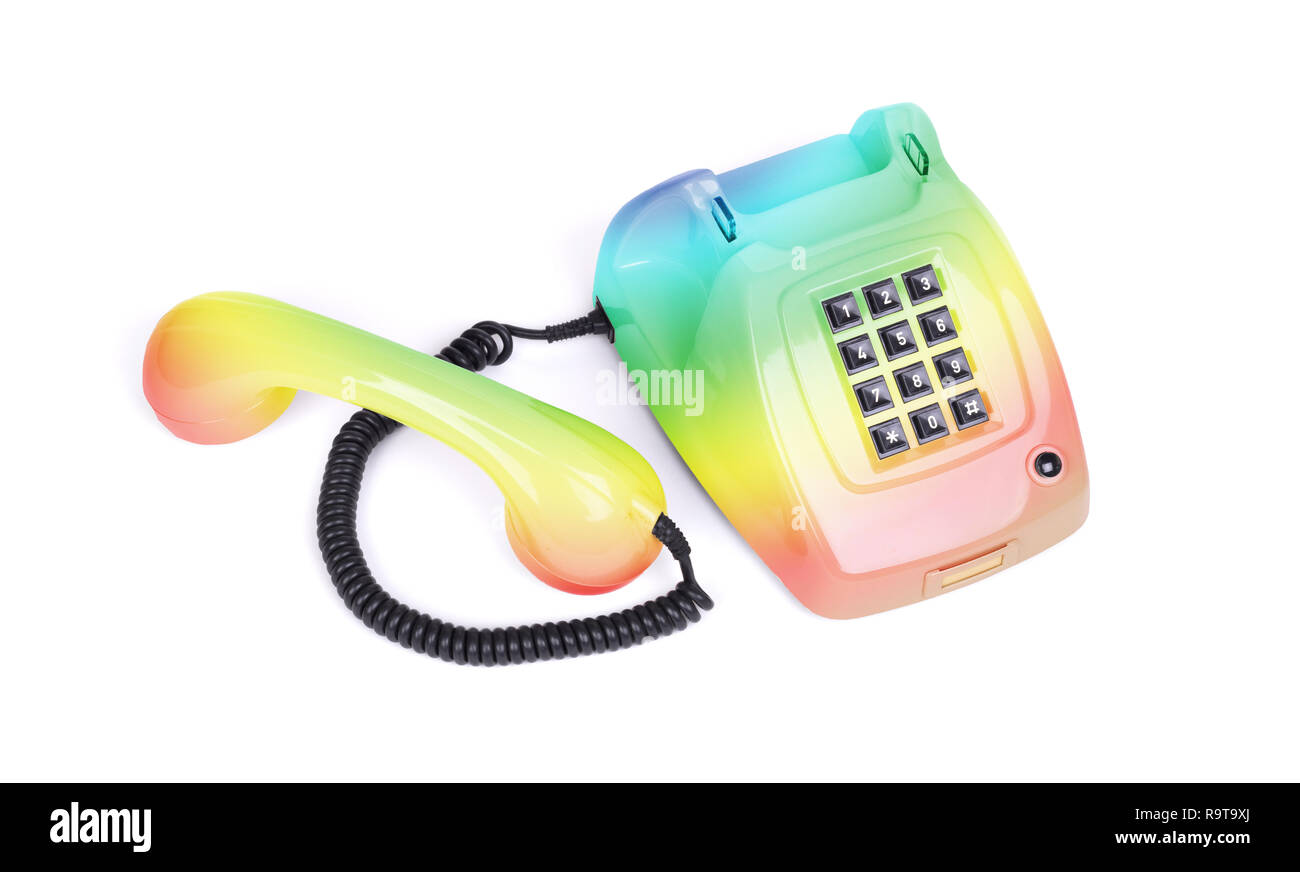 Vintage rainbow colored telephone with a white background Stock Photo ...