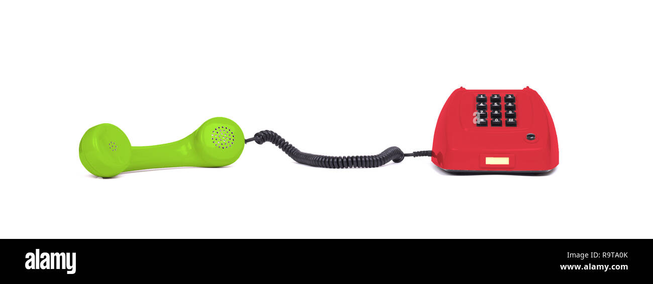 Vintage multi colored telephone with a white background Stock Photo - Alamy