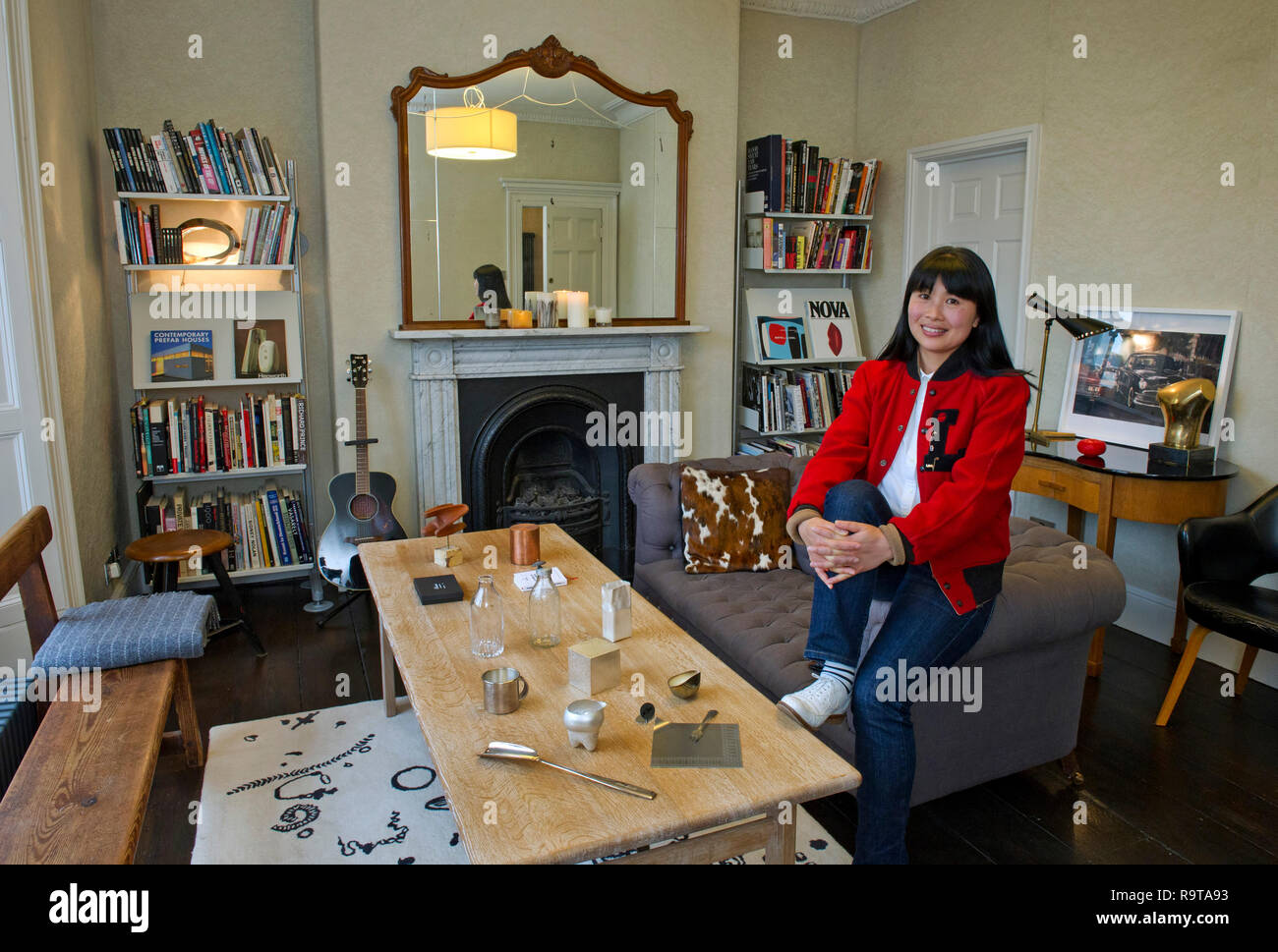 Li Cheung, jewelry designer in her house in Totnes, Devon, UK Stock ...