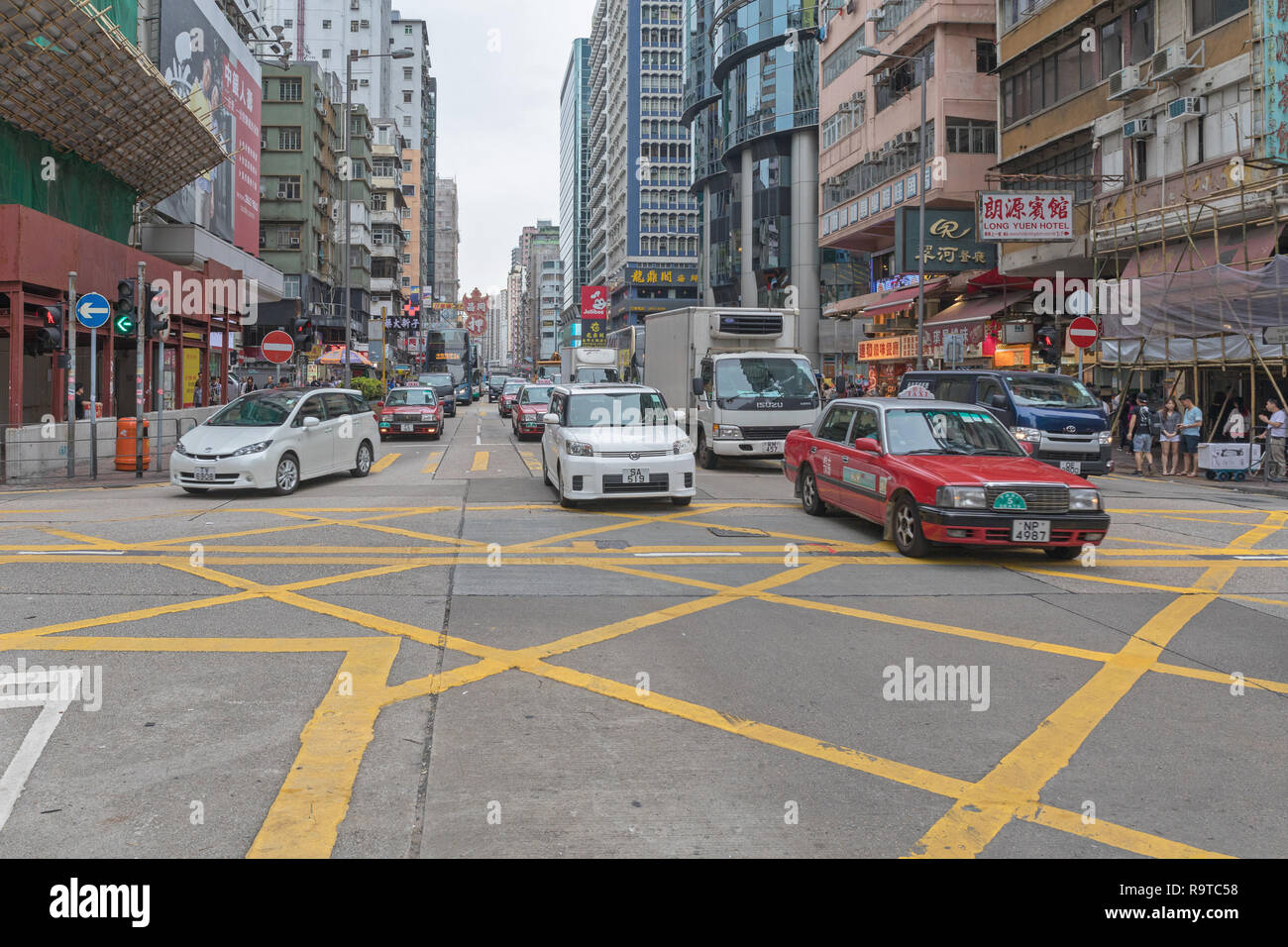 KOWLOON, HONG KONG - APRIL 22, 2017: Morning Traffic at Street ...