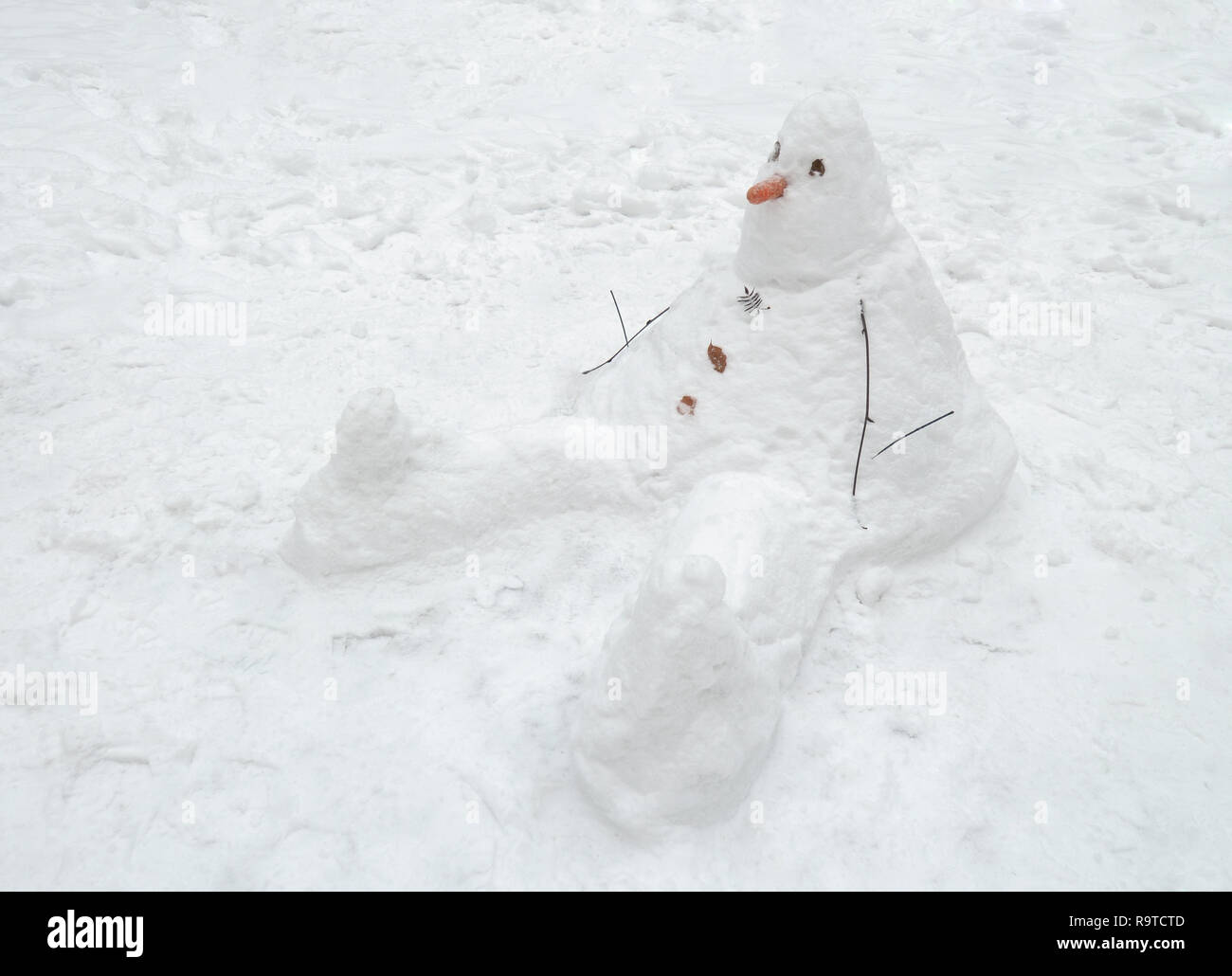 Snowman cobbled together by children.This traditional winter pastime ...