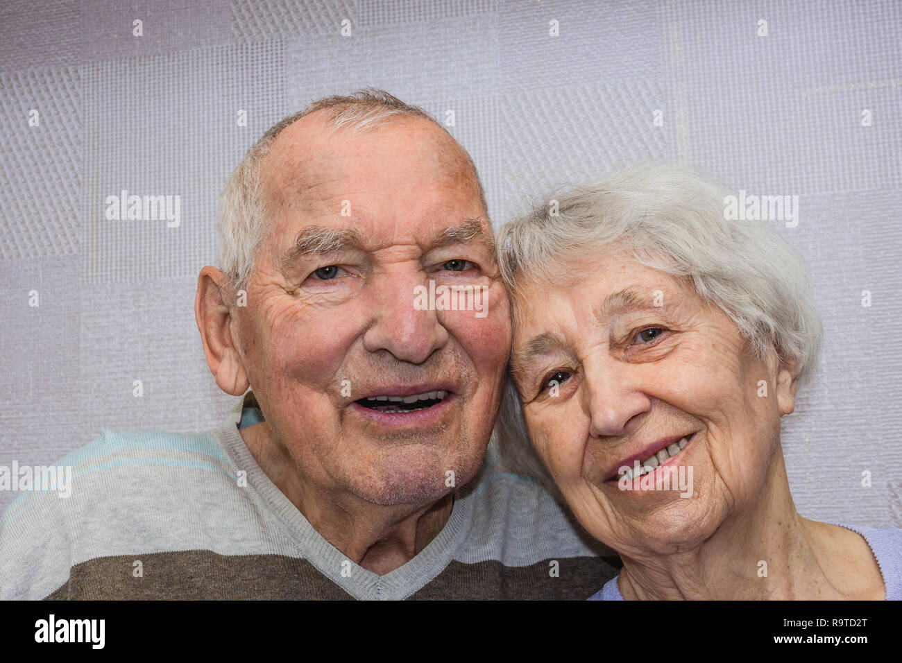 Happy senior old man and woman embracing, romantic family couple, love ...