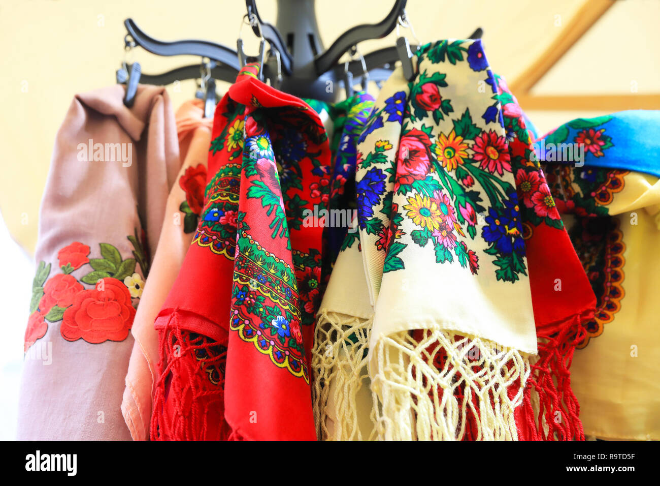 Pretty, traditional Polish scarves for sale on stalls on the Christmas ...