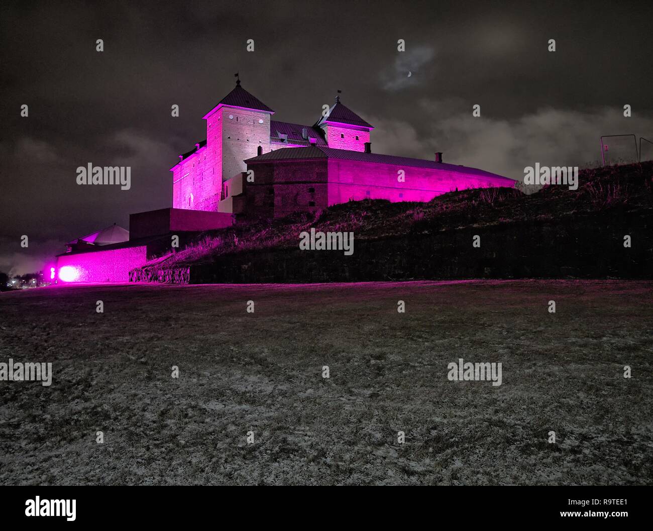 Medieval castle exterior night scene during light festival. Surreal ...