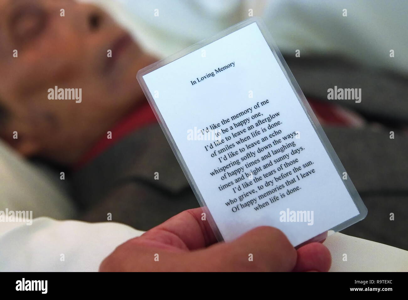 A prayer or memorial card at a funeral home. Prayers cards can be ...