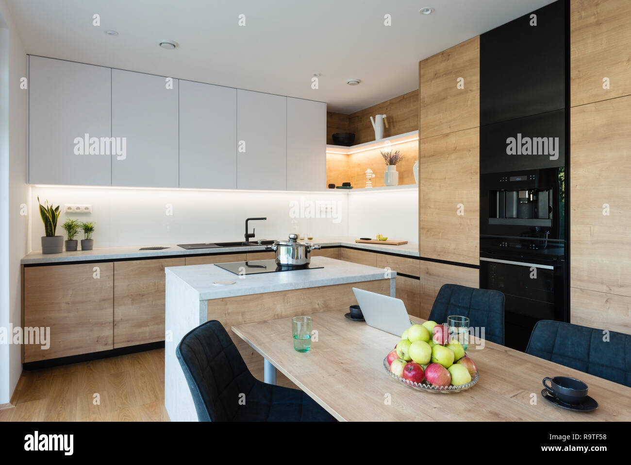 Interior of modern kitchen in a house Stock Photo - Alamy