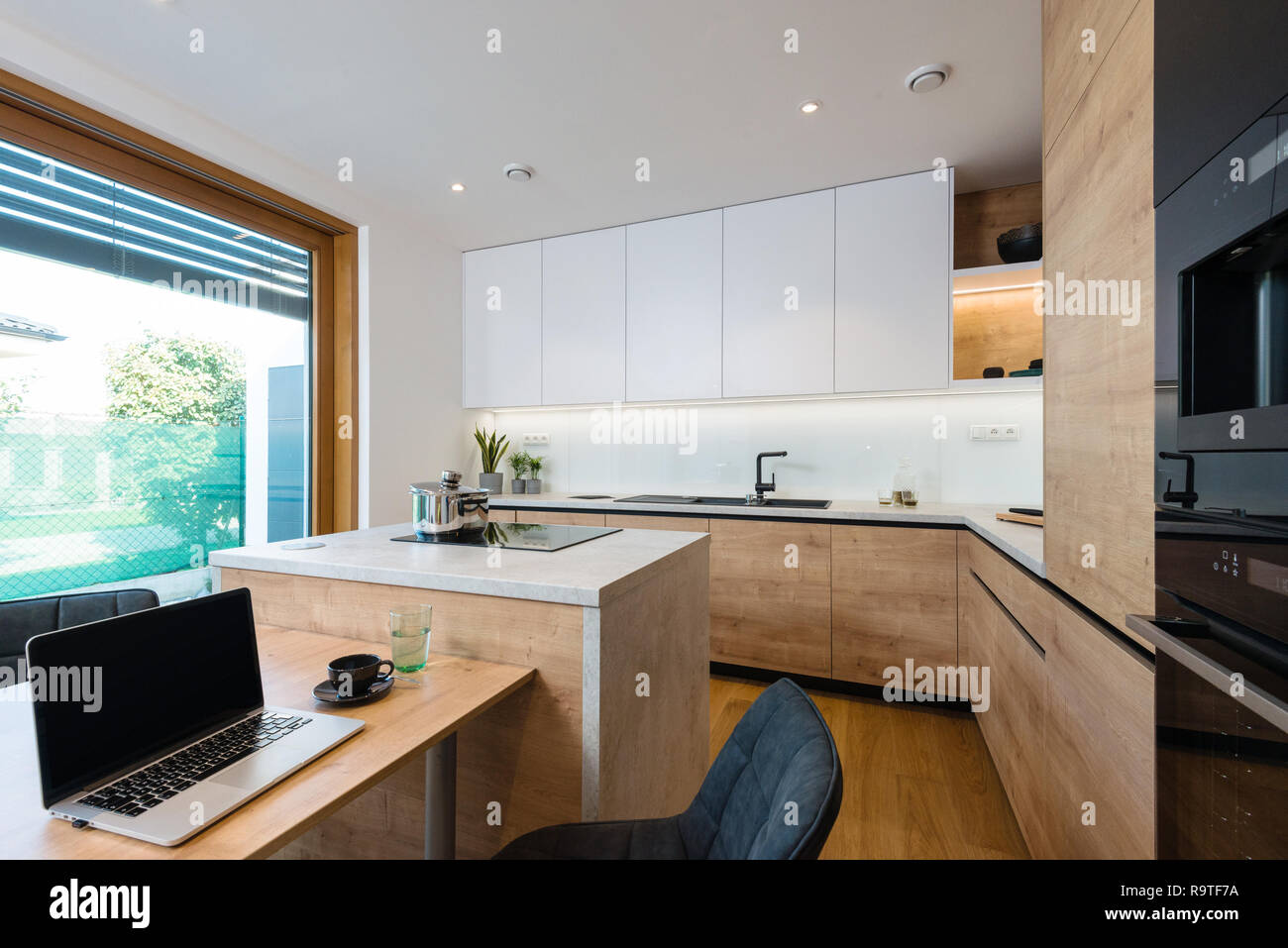 Interior of modern kitchen in a house Stock Photo - Alamy