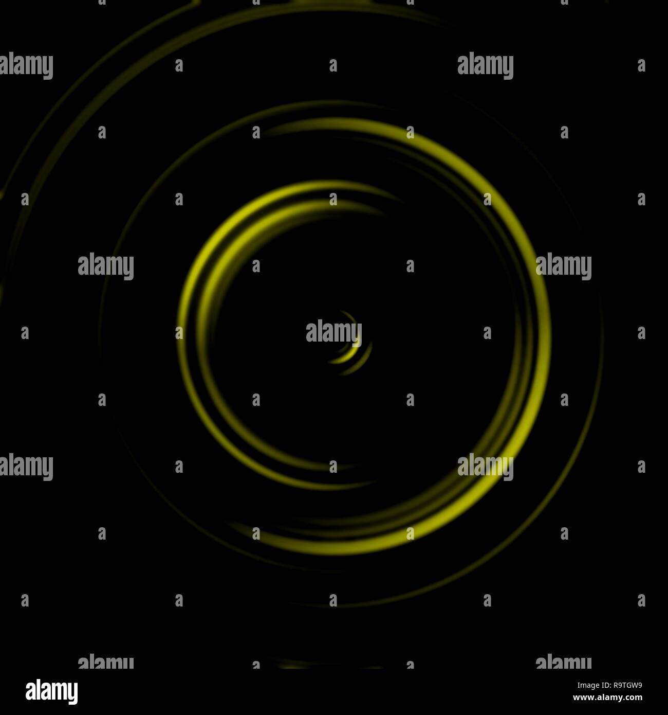 Abstract yellow spin signal on black background Stock Photo - Alamy