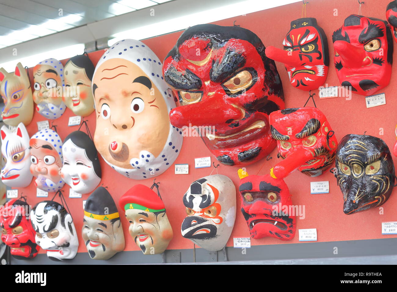 Japanese traditional wooden mask sold at Nakamise shopping street in ...