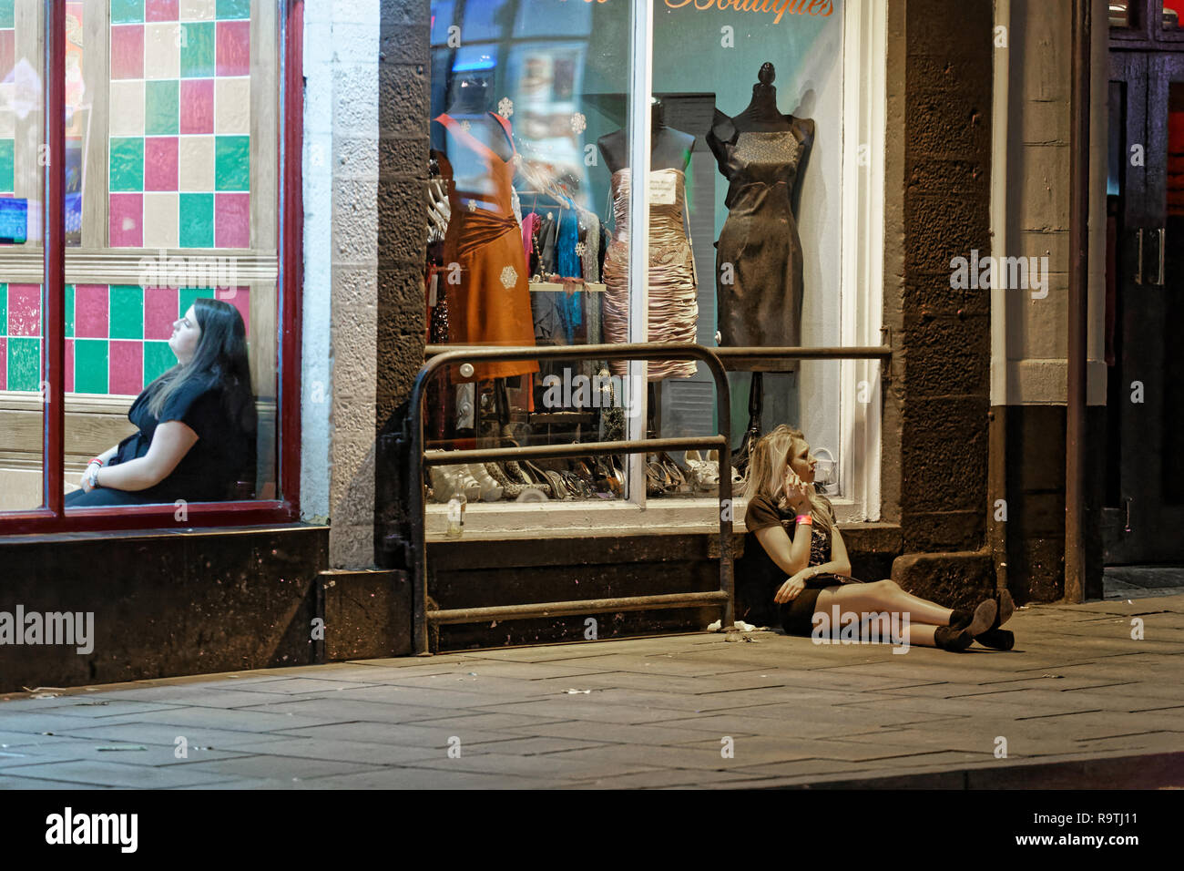 Pictured: A woman sits on the pavement. Friday 14 December 2018 Re ...